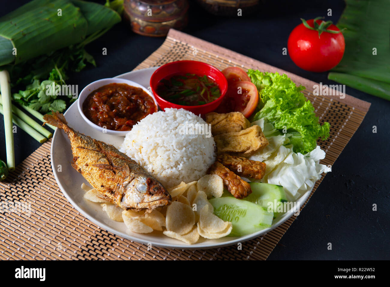 indonesian mackerel fried with rice Stock Photo - Alamy