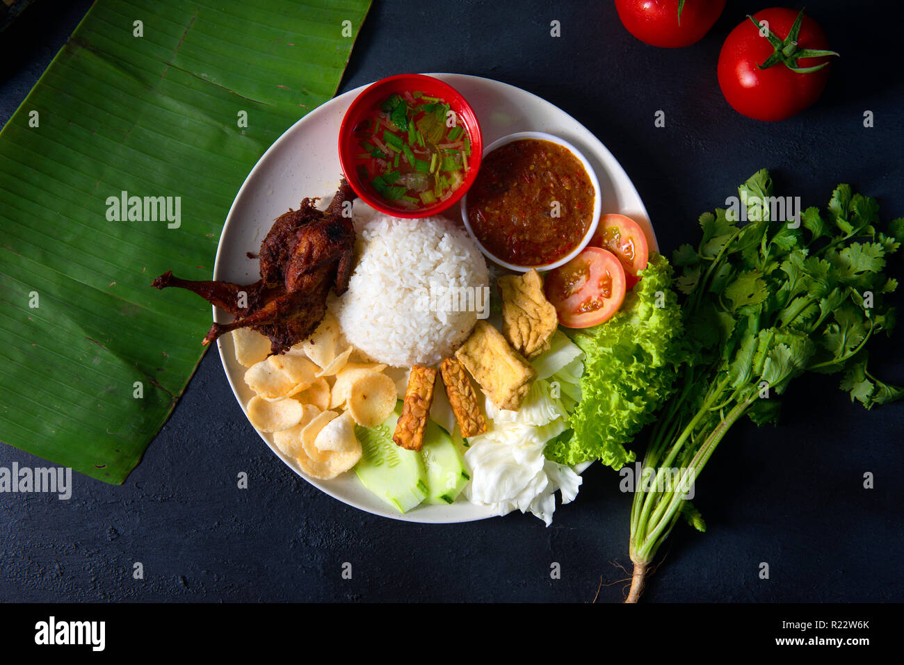 nasi lemak kukus with quail meat top view, malaysian local food Stock ...