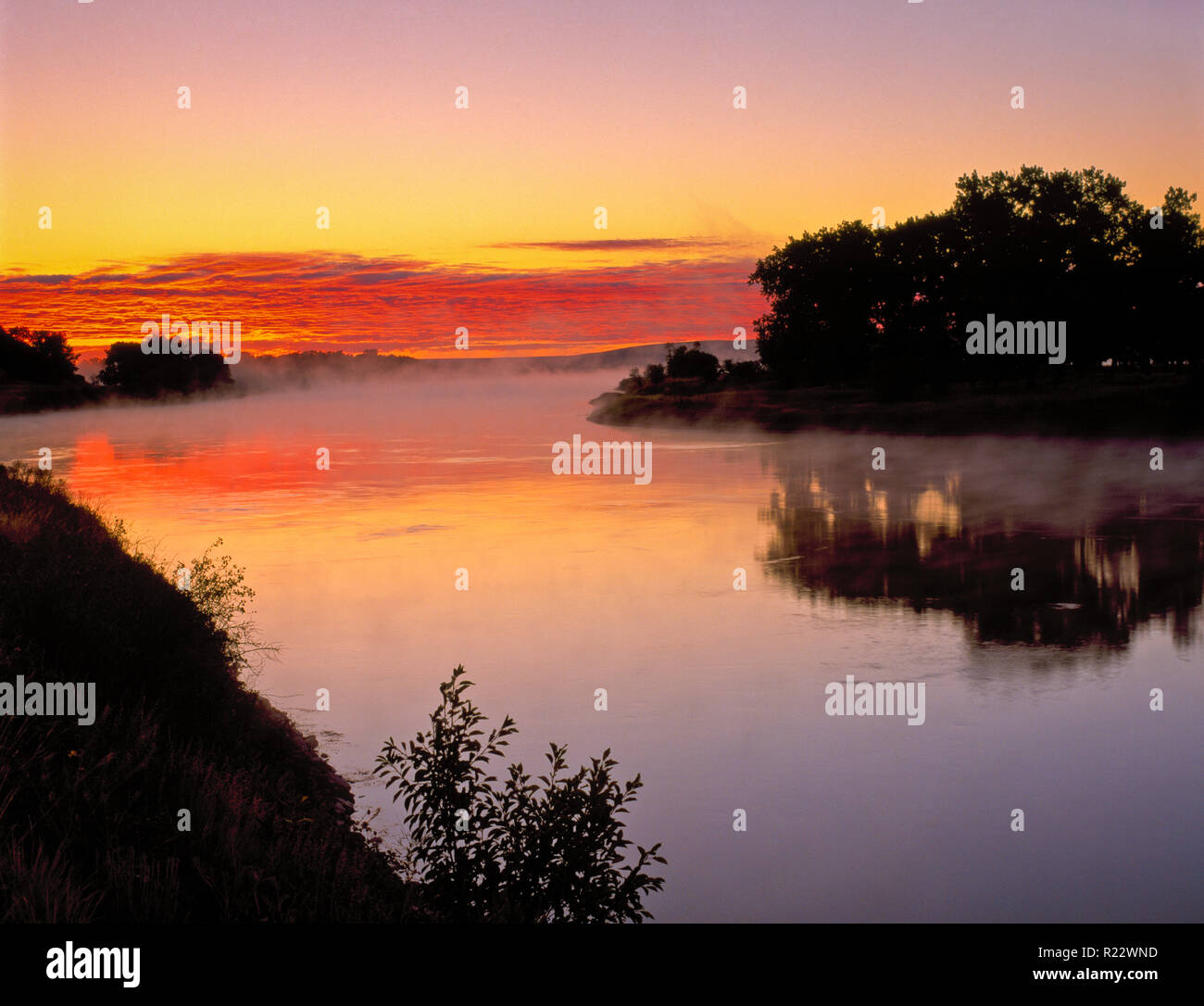 sunrise over the missouri river near ulm, montana Stock Photo - Alamy