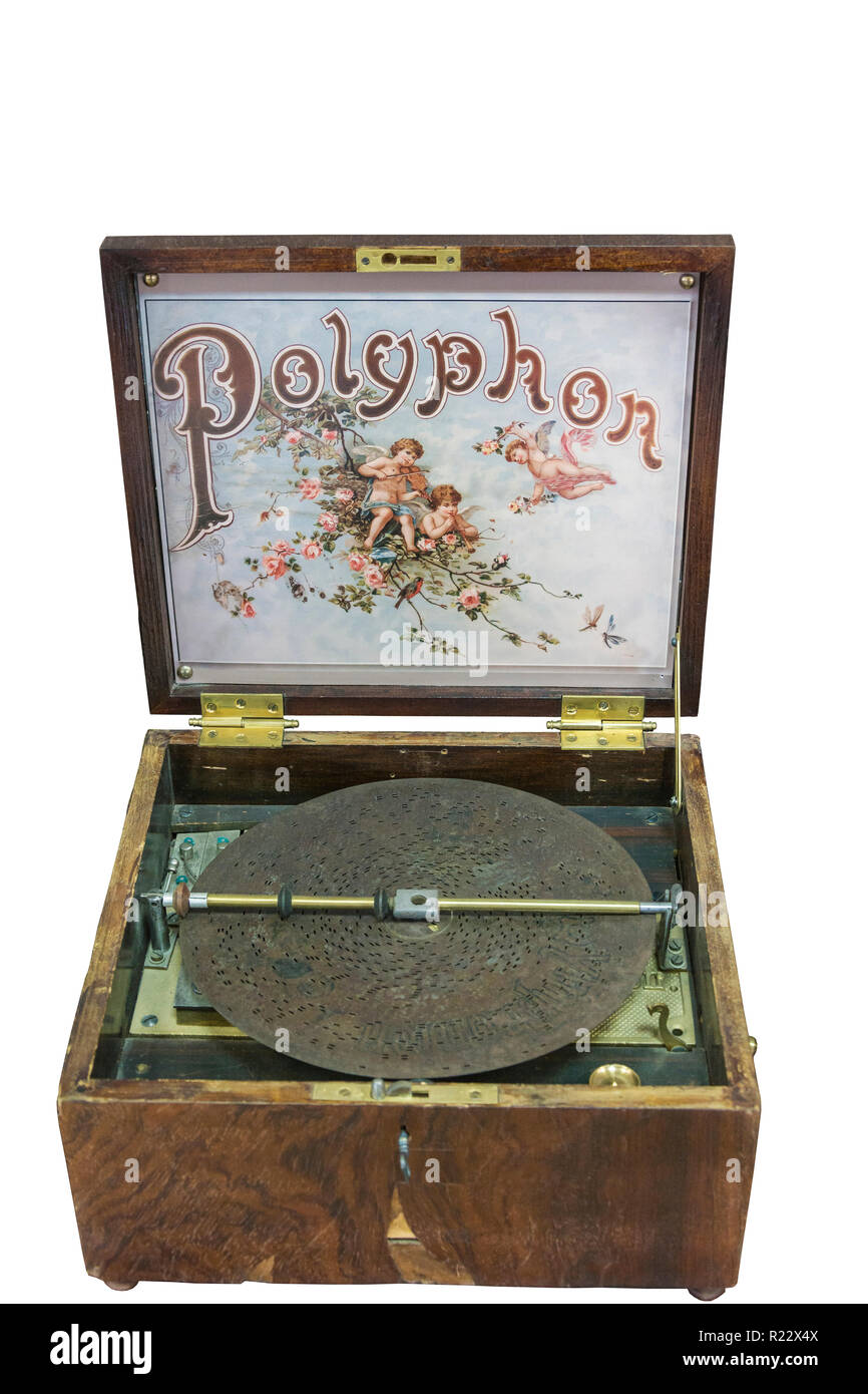 Old-time music box Simphonion of the late 19th century on a white ...