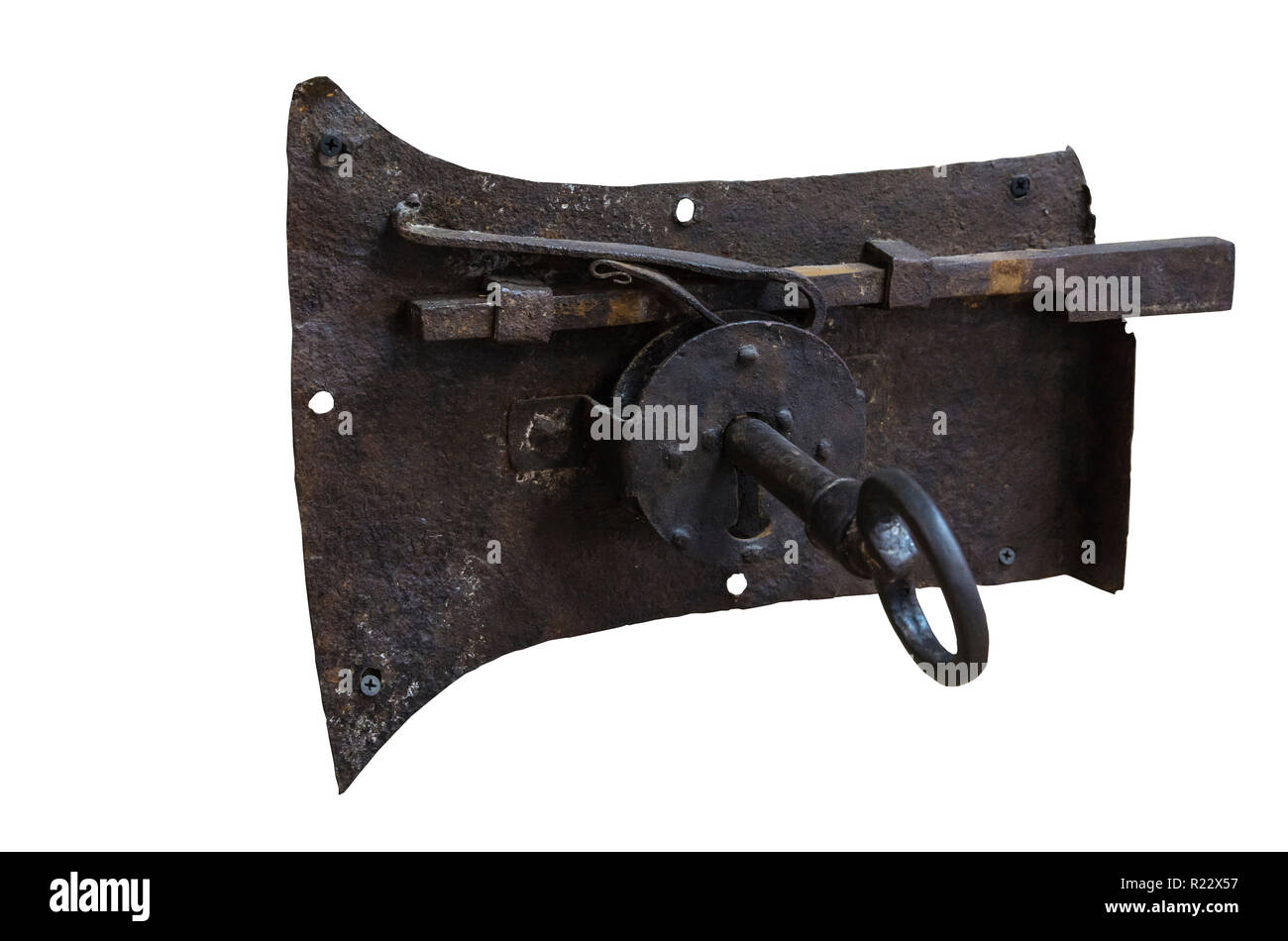 Old rusty large iron lock with a unique design key on a white ...