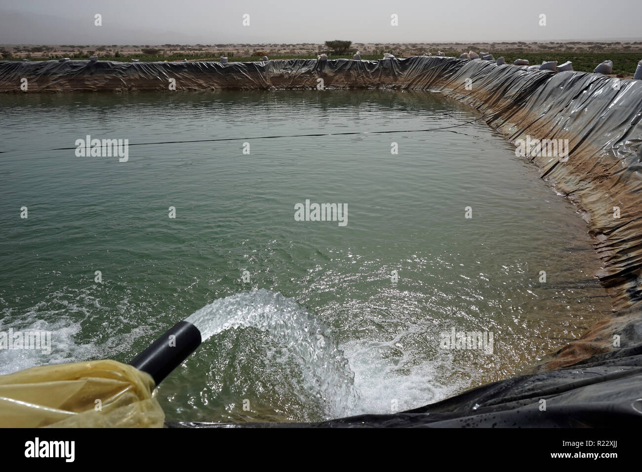Reservoir with water and farmland inb Jordan Stock Photo - Alamy
