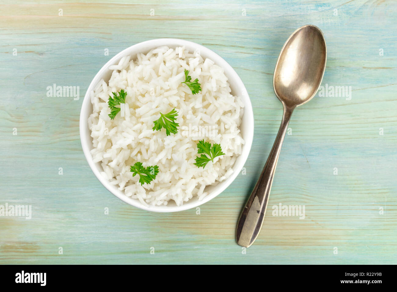 A photo of a bowl of cooked white long rice, shot from the top on a ...