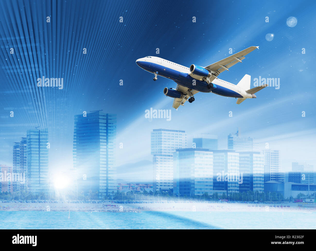 Plane flying rapidly over the buildings among the clouds Stock Photo ...