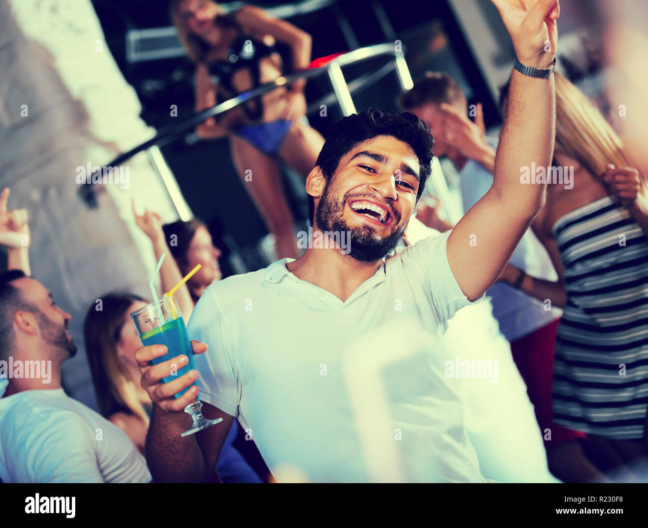 Guy in night club holding hi-res stock photography and images - Alamy