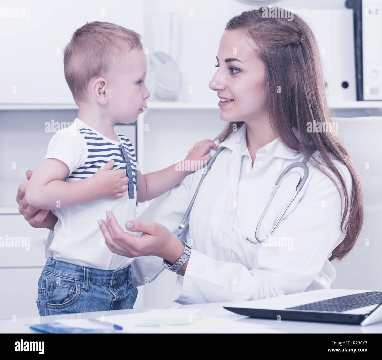 Boy in consultation adult hi-res stock photography and images - Alamy