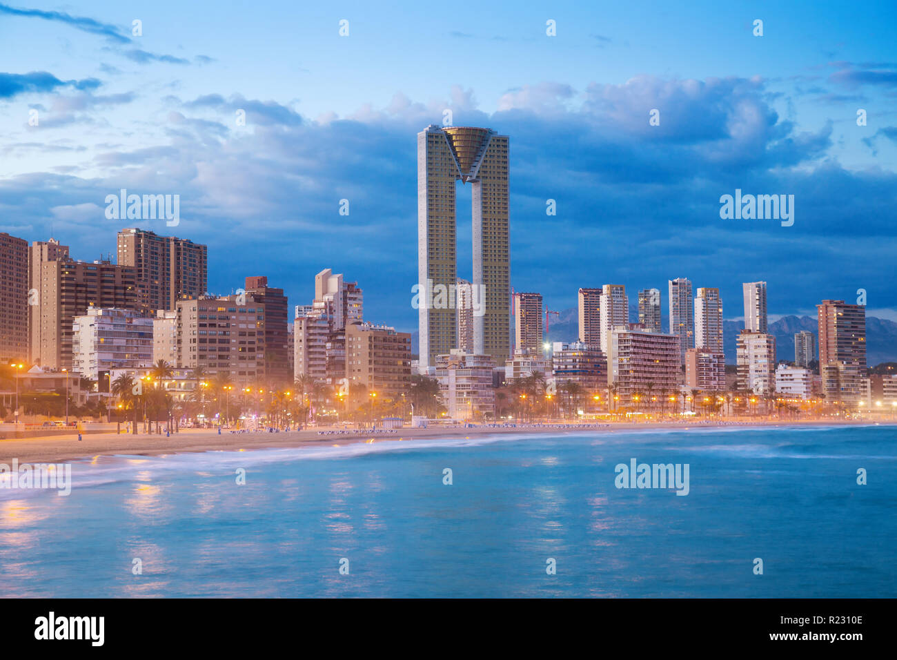 night panoramic view on lights of Benidorm city with seafront and ...