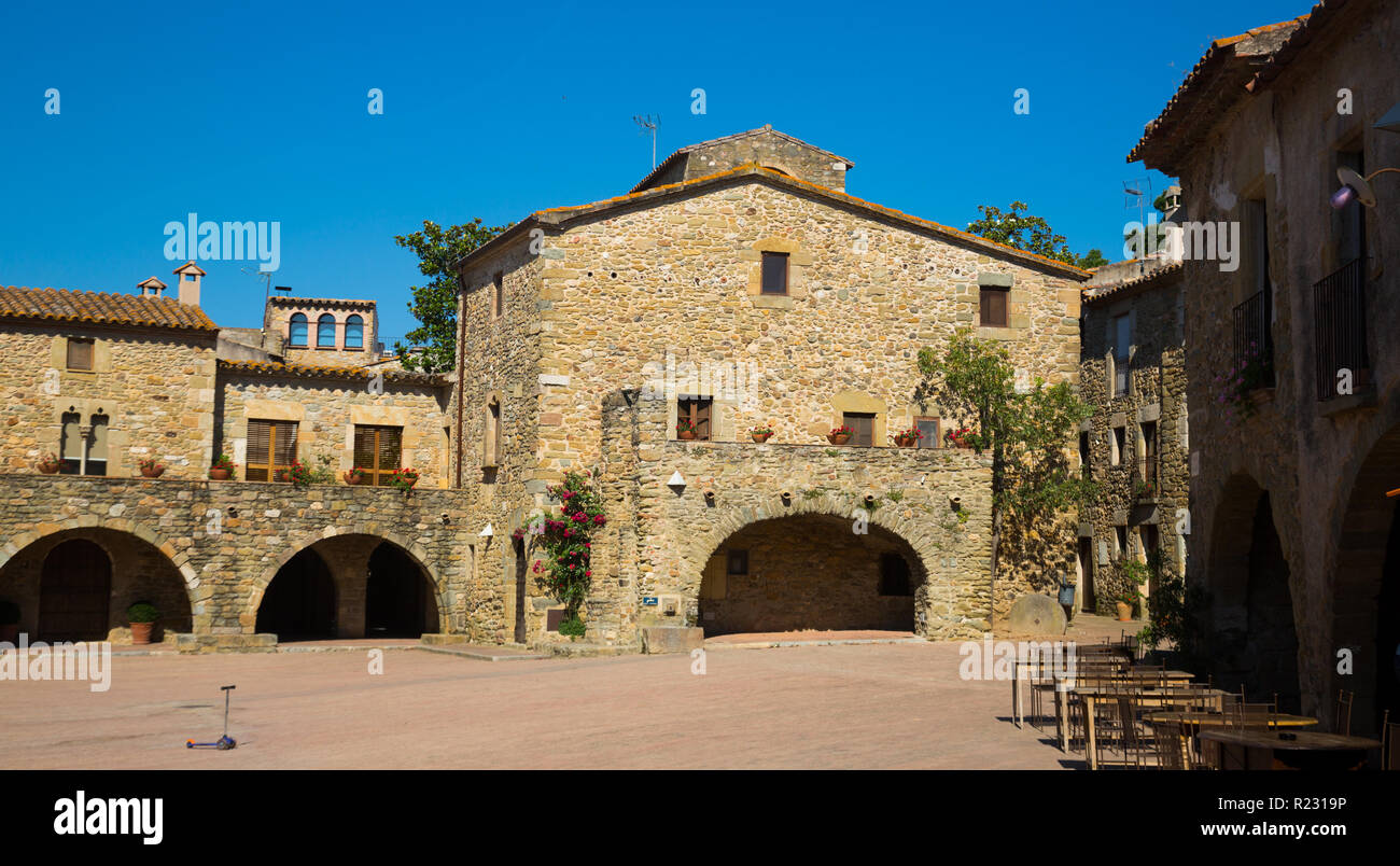 View of medieval street in Catalan village of Monells, Spain Stock ...