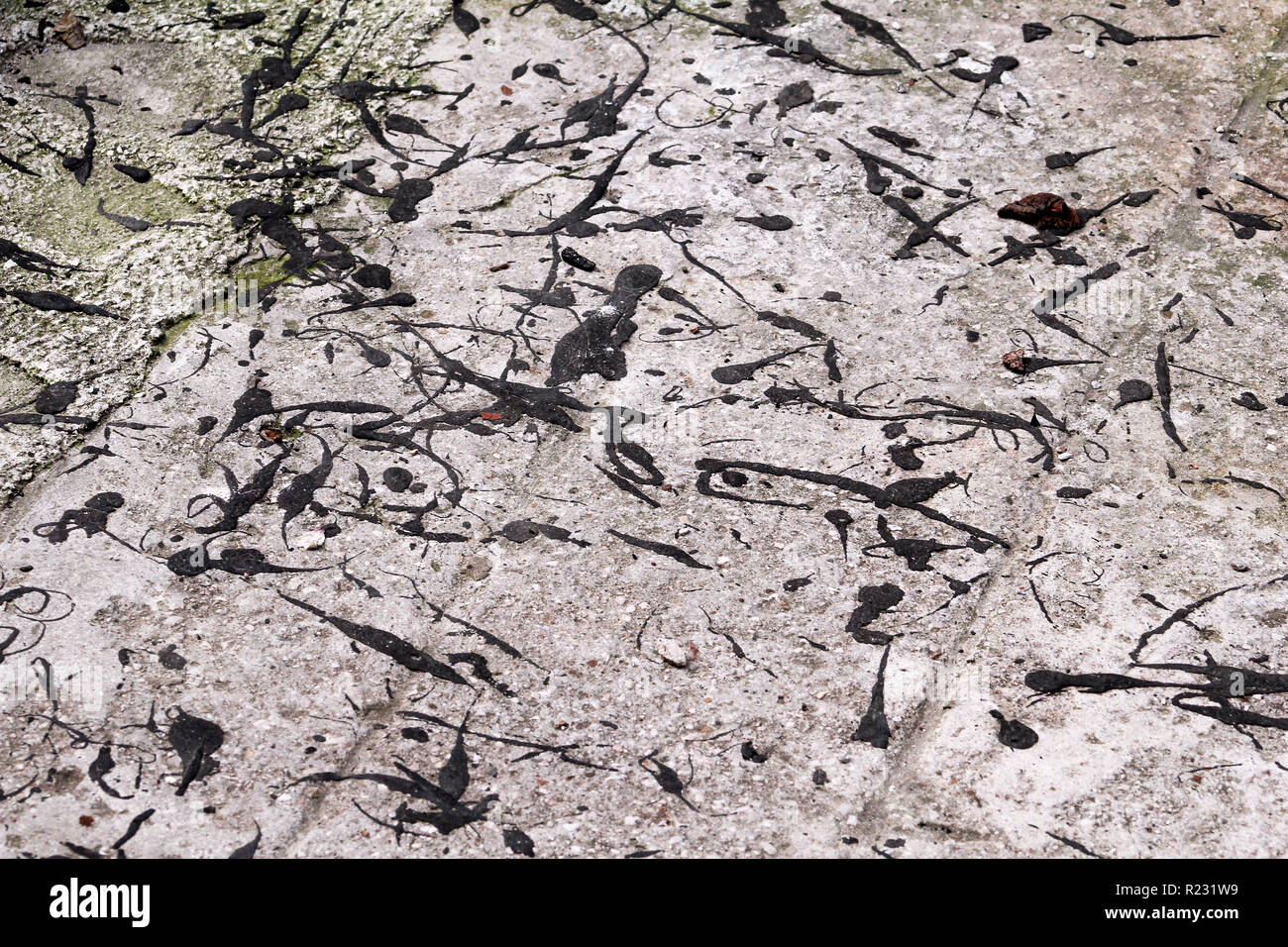 Detail of concrete with bitumen and tar / Asphalt texture background ...