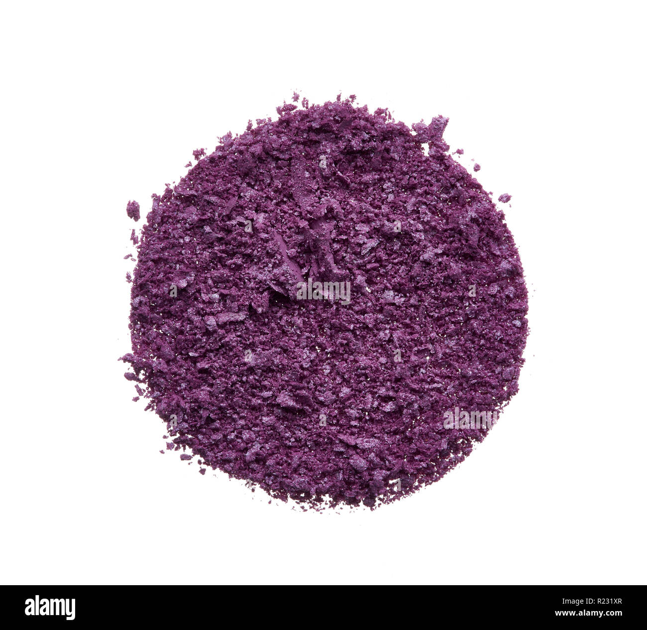 Texture of broken violet eye shadow isolated on white background. Macro ...