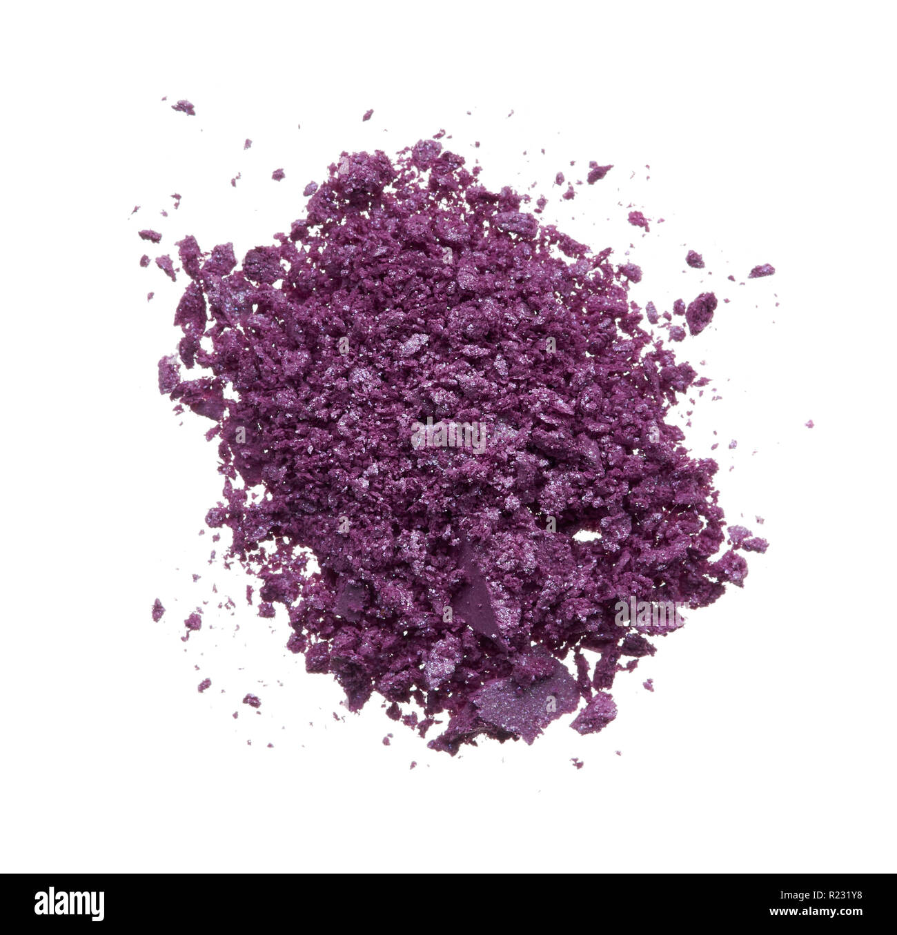 Texture of broken violet eye shadow isolated on white background. Macro ...