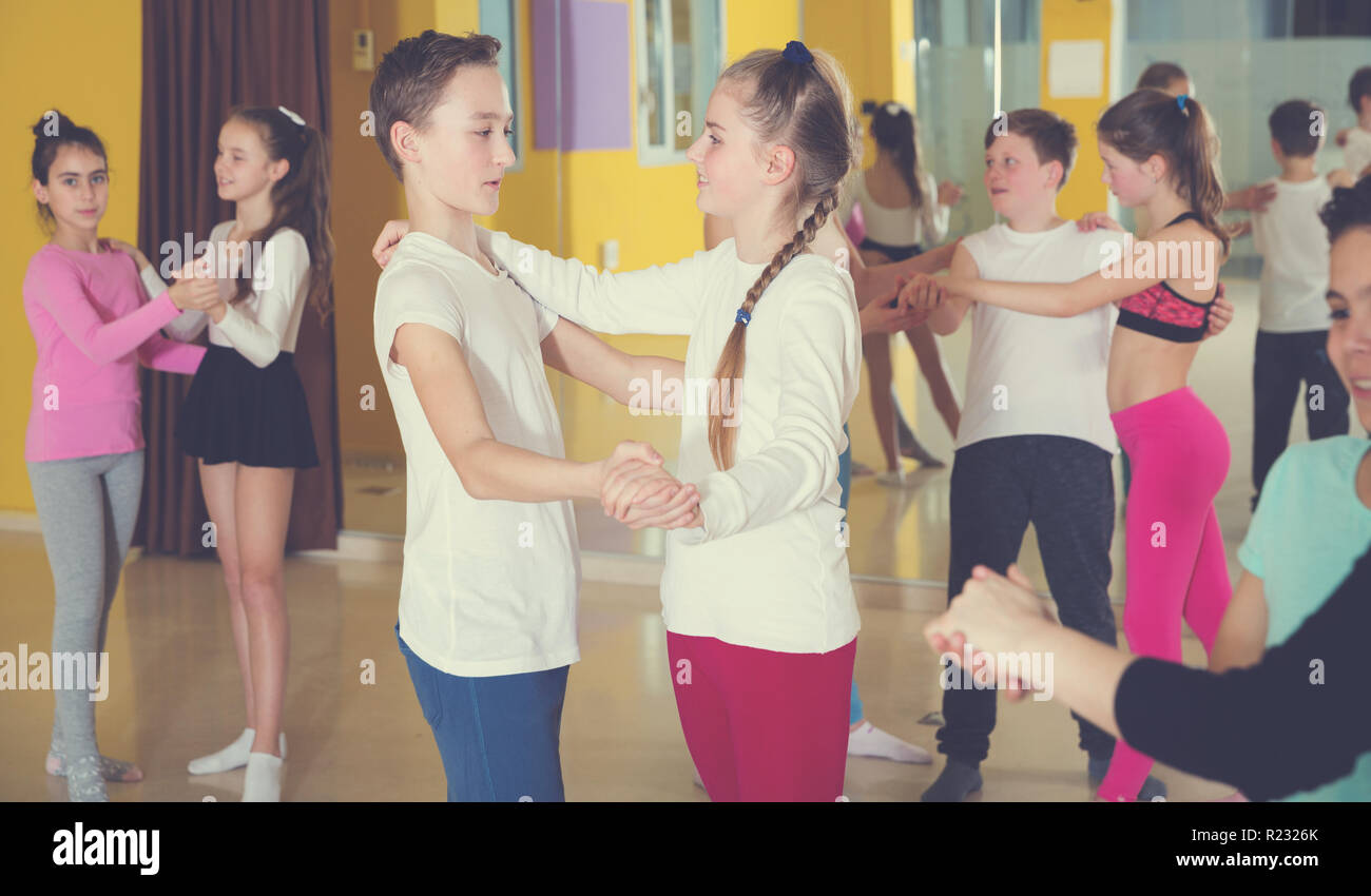 Children dancing together slow ballroom dances in pairs in choreography ...