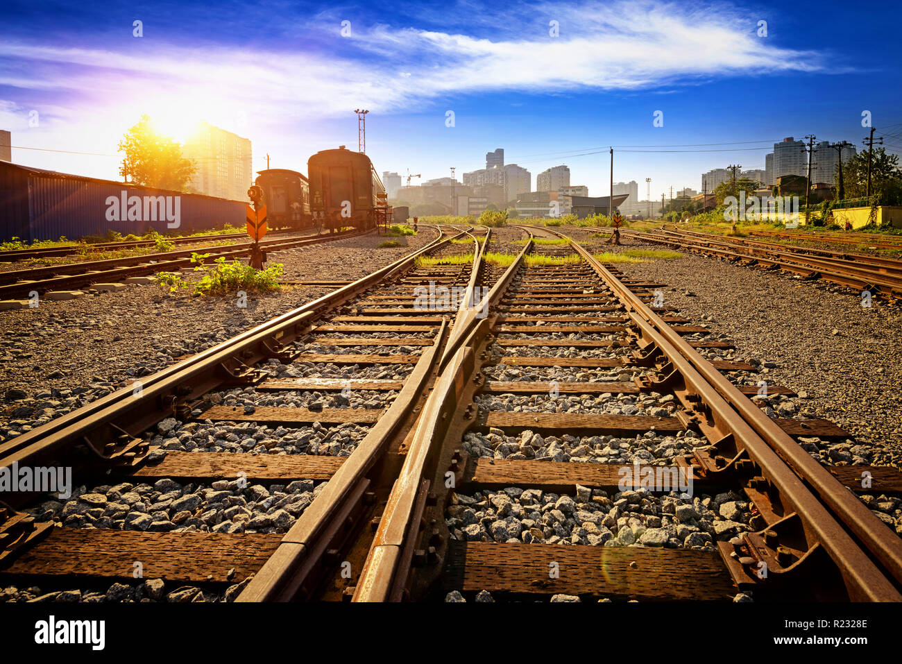 Cargo train platform at sunset with container Stock Photo - Alamy