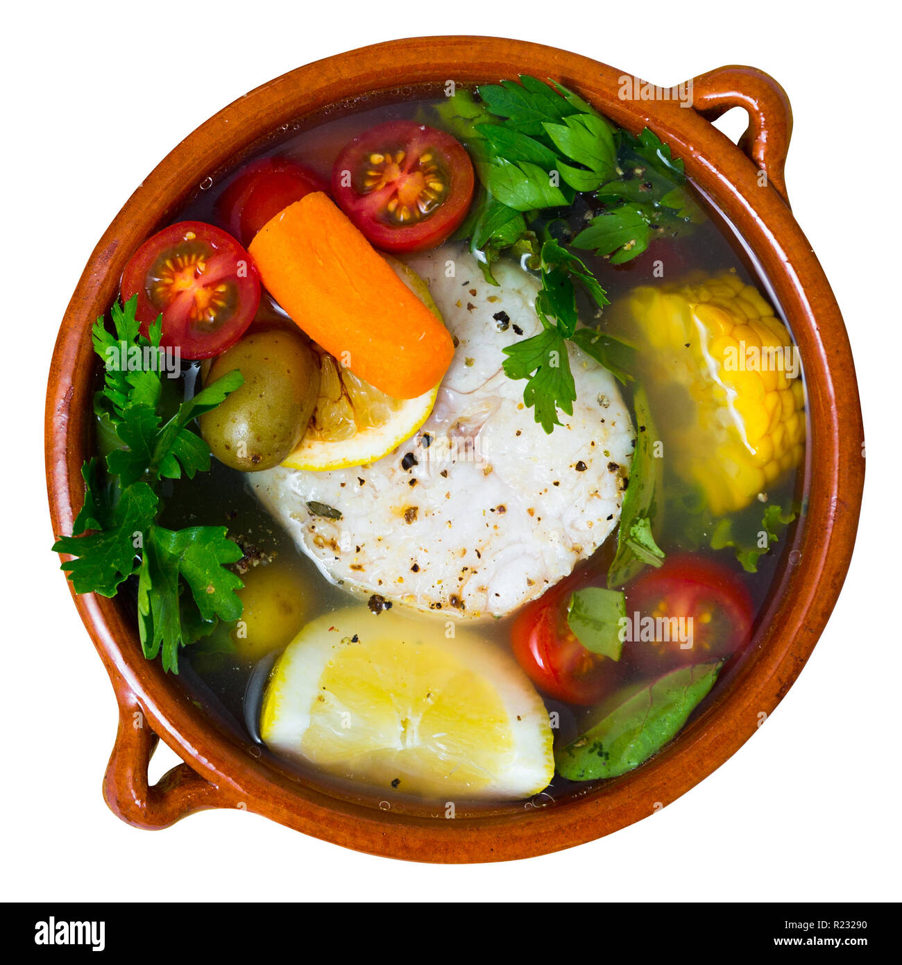 Fish soup with hake. Isolated over white background Stock Photo - Alamy