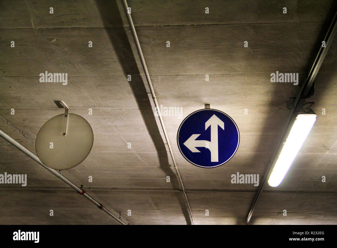 Traffic sign one way street sign in underground parking garage / Car ...