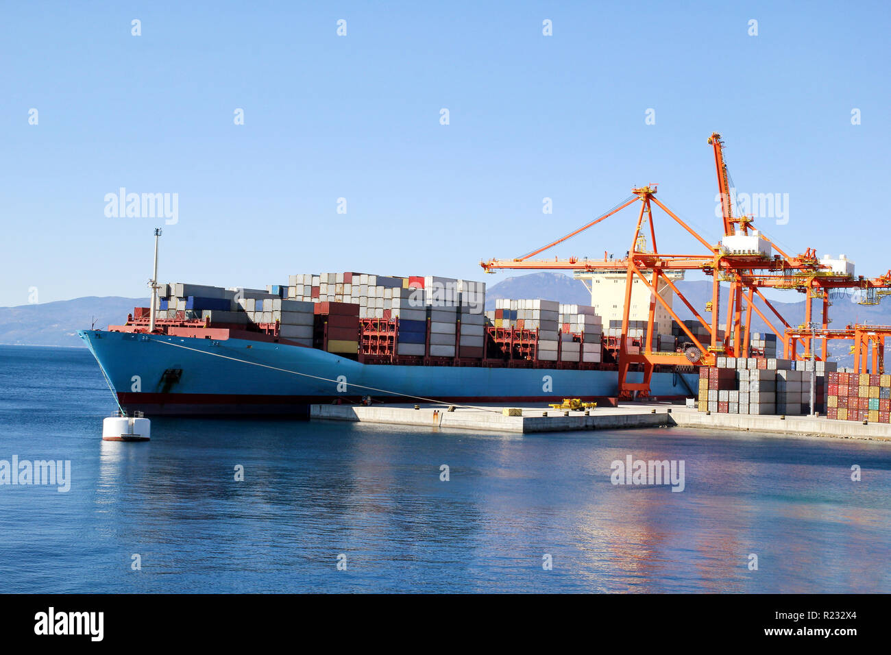 Container ship for carriage of goods with containers to shore in port ...