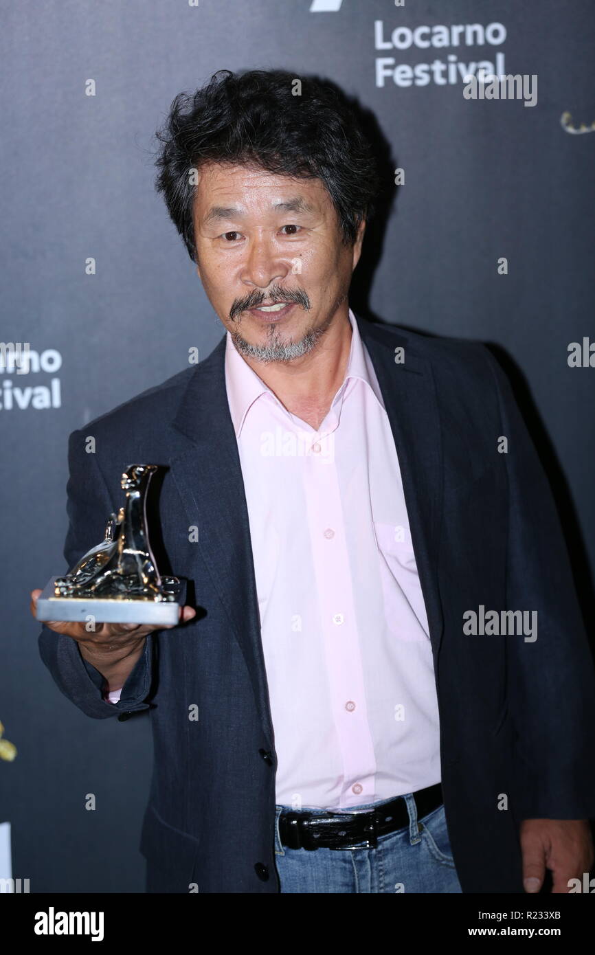 LOCARNO, SWITZERLAND – AUG 11, 2018: Gi Ju-bong receives the Prize for ...