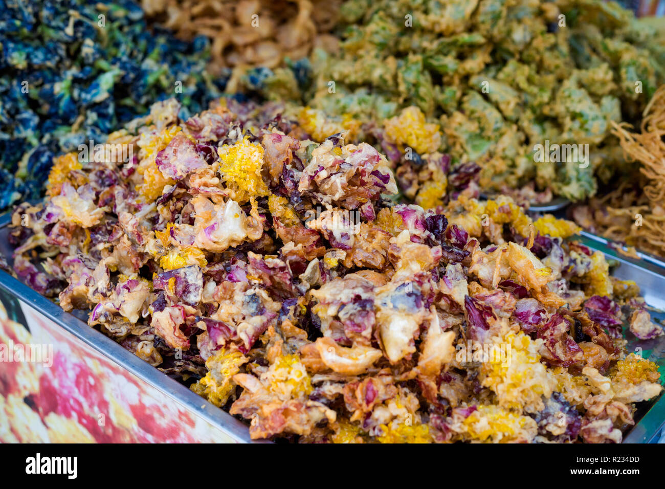 Fresh prepared asian deep fried crispy flowers on local market ...