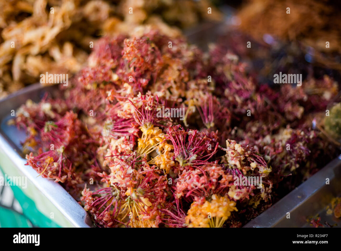 Fresh prepared asian deep fried crispy flowers on local market ...