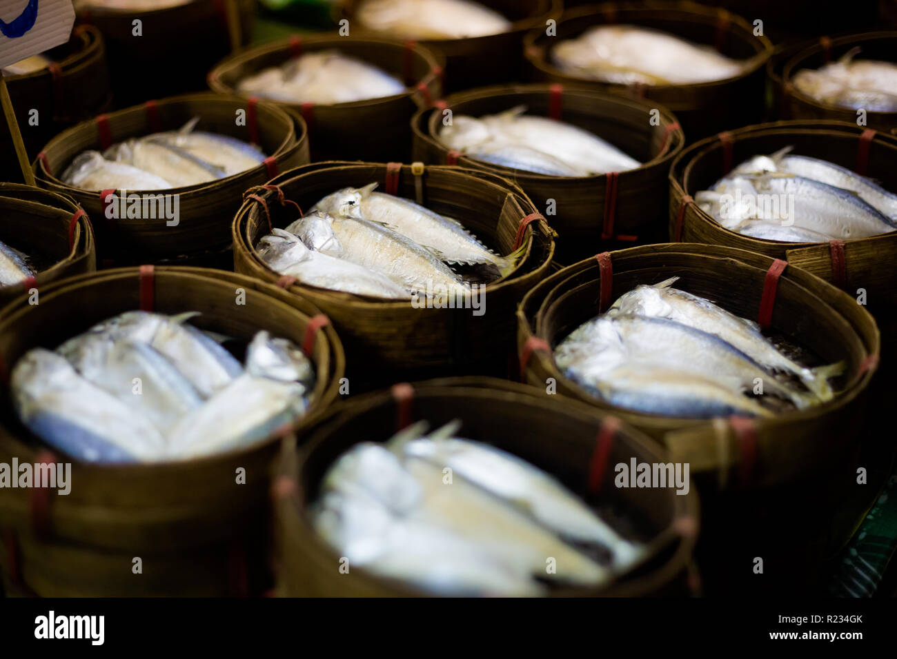 Thai raw fishes on local market in Bangkok. Traditional way of selling ...