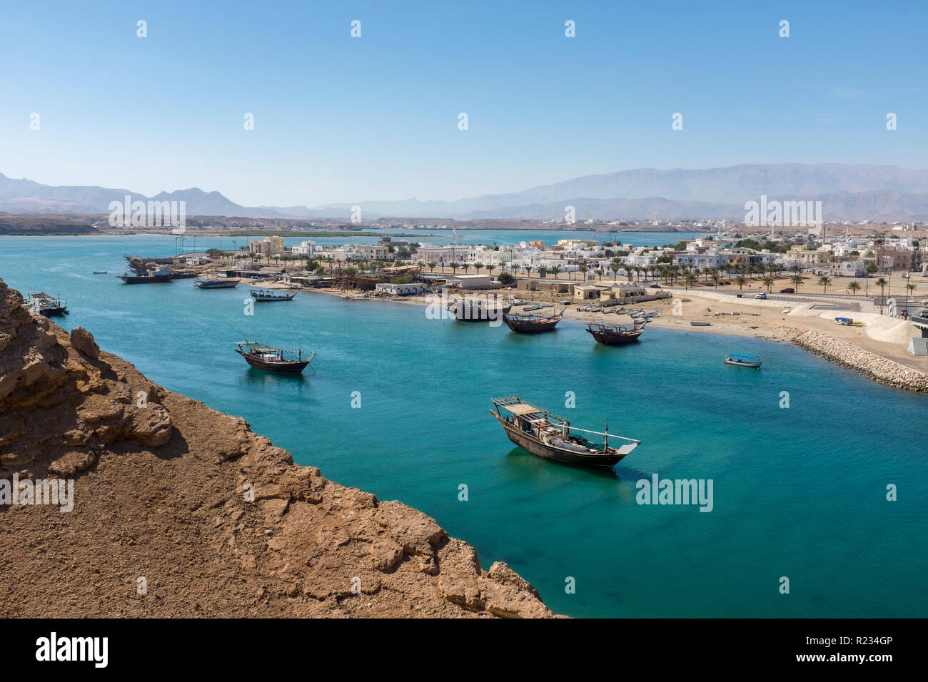Traditional wooden dhow boats and the shipbuilding district in Sur ...