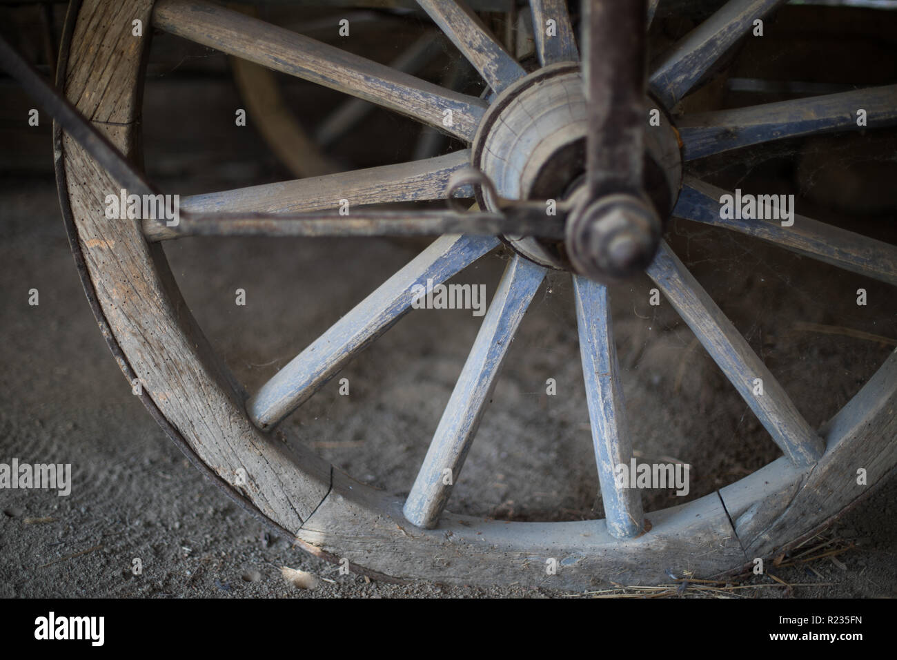 Color image of a old wooden cart wheel Stock Photo - Alamy