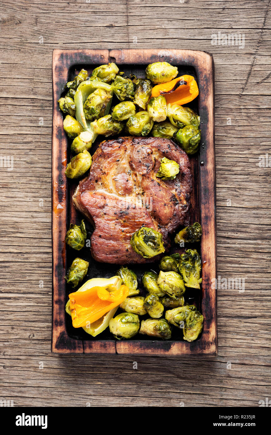 Grilled meat barbecue steak with brussels sprouts.Grilled meat and ...