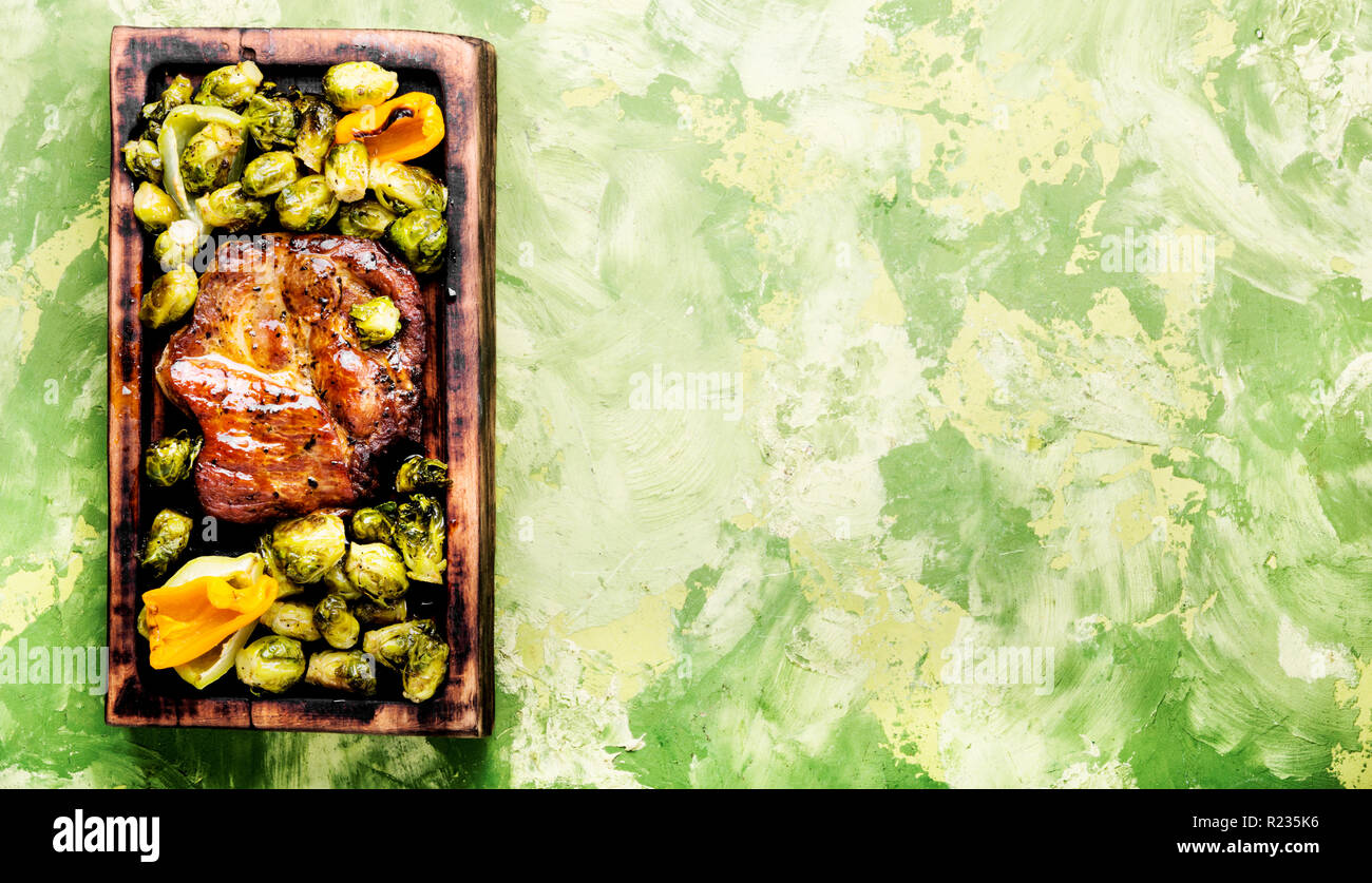 Grilled meat barbecue steak with brussels sprouts.Grilled meat and ...
