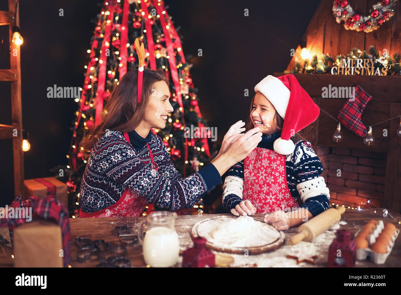 Merry Christmas and Happy Holidays. Family preparation holiday food ...