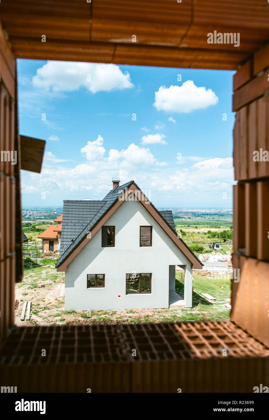 Building a new houses. Sunny day Stock Photo - Alamy