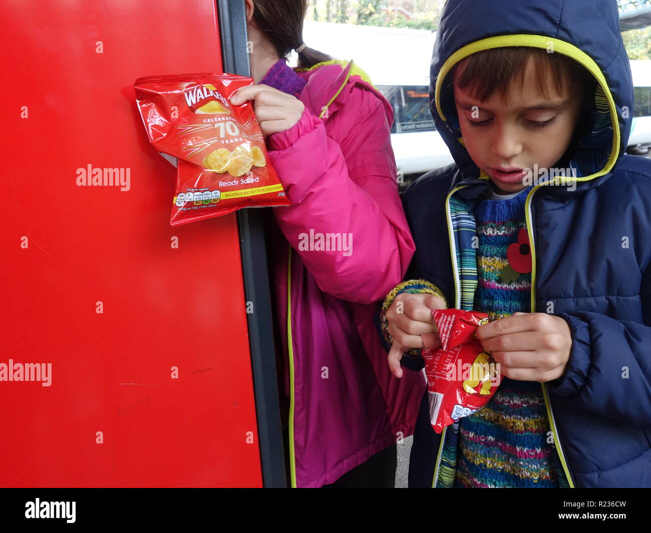 Child Eating Crisps High Resolution Stock Photography and Images - Alamy