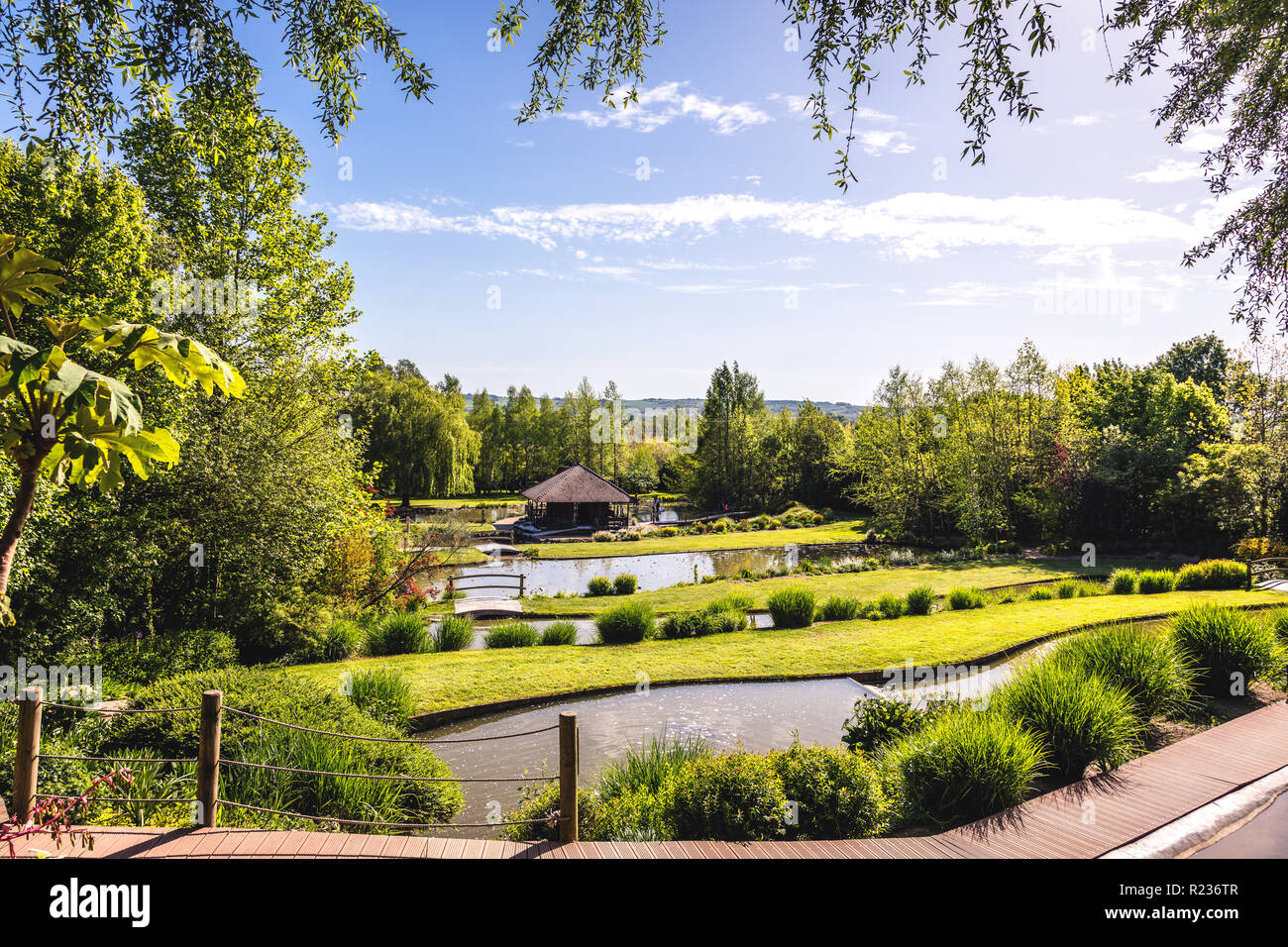 Flower garden with stone path and fence hi-res stock photography and ...
