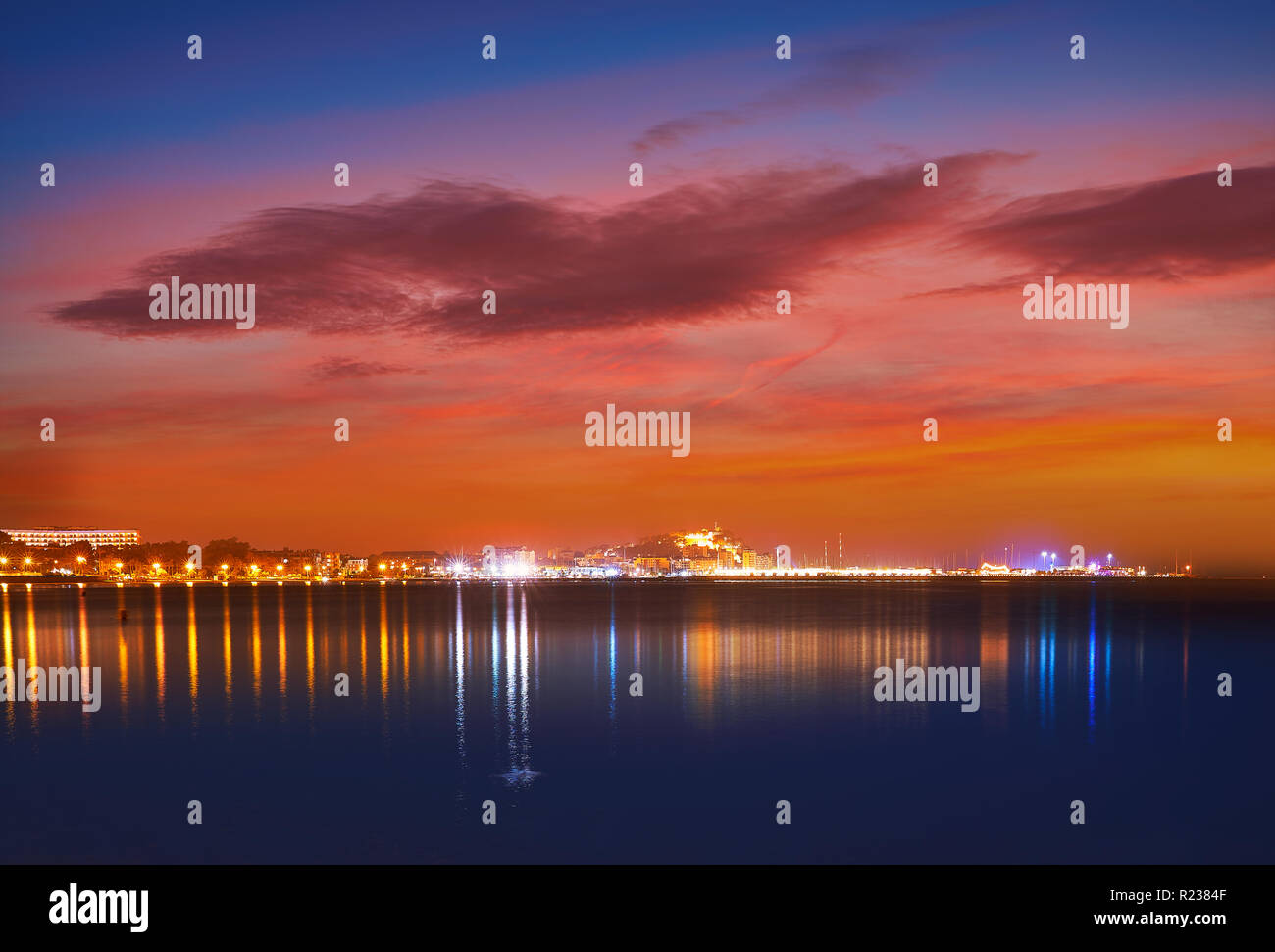 Denia sunset skyline from Las Rotas in Alicante of Mediterranean Spain ...