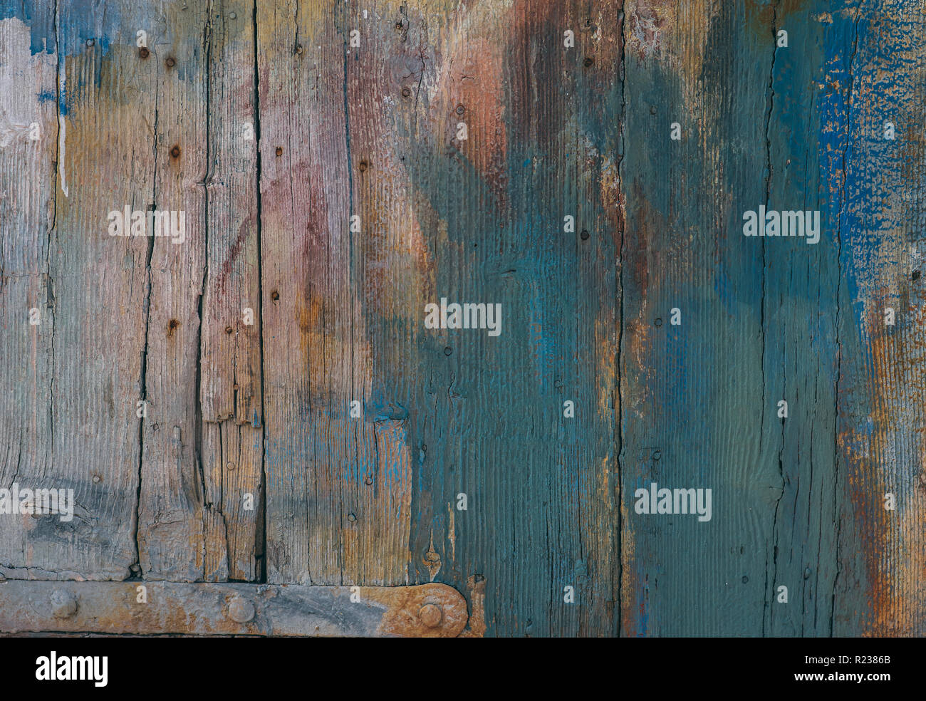 Old door with different paint, use as natural background Stock Photo ...
