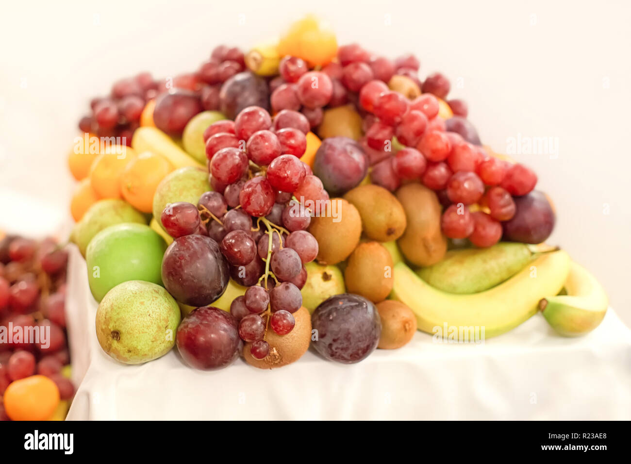 Fruit heap on the table. Selective focus Stock Photo - Alamy