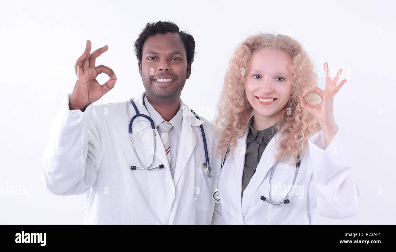 two doctors of the medical center showing OK gesture Stock Photo - Alamy