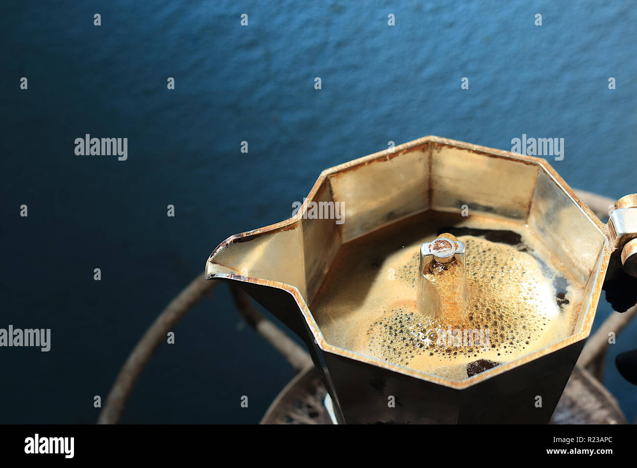 The Italian Moka pot is brewing coffee, and the beverage is beginning ...