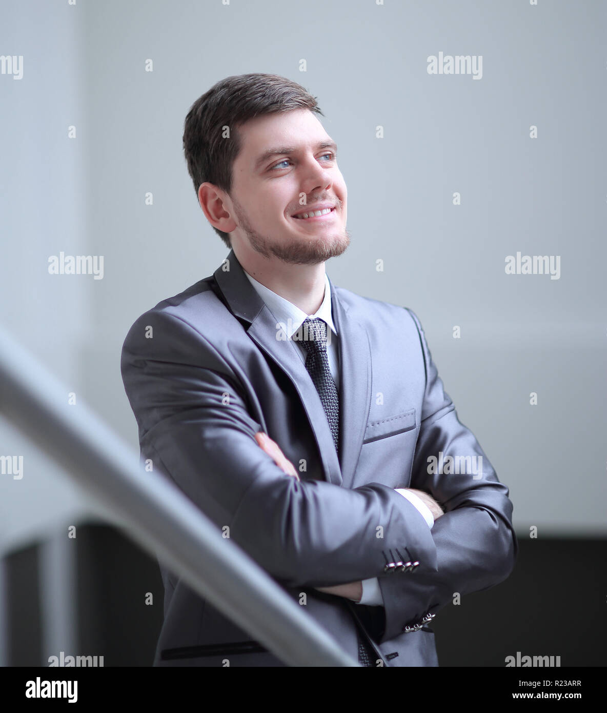 rear view.thoughtful businessman looking out the office window Stock ...