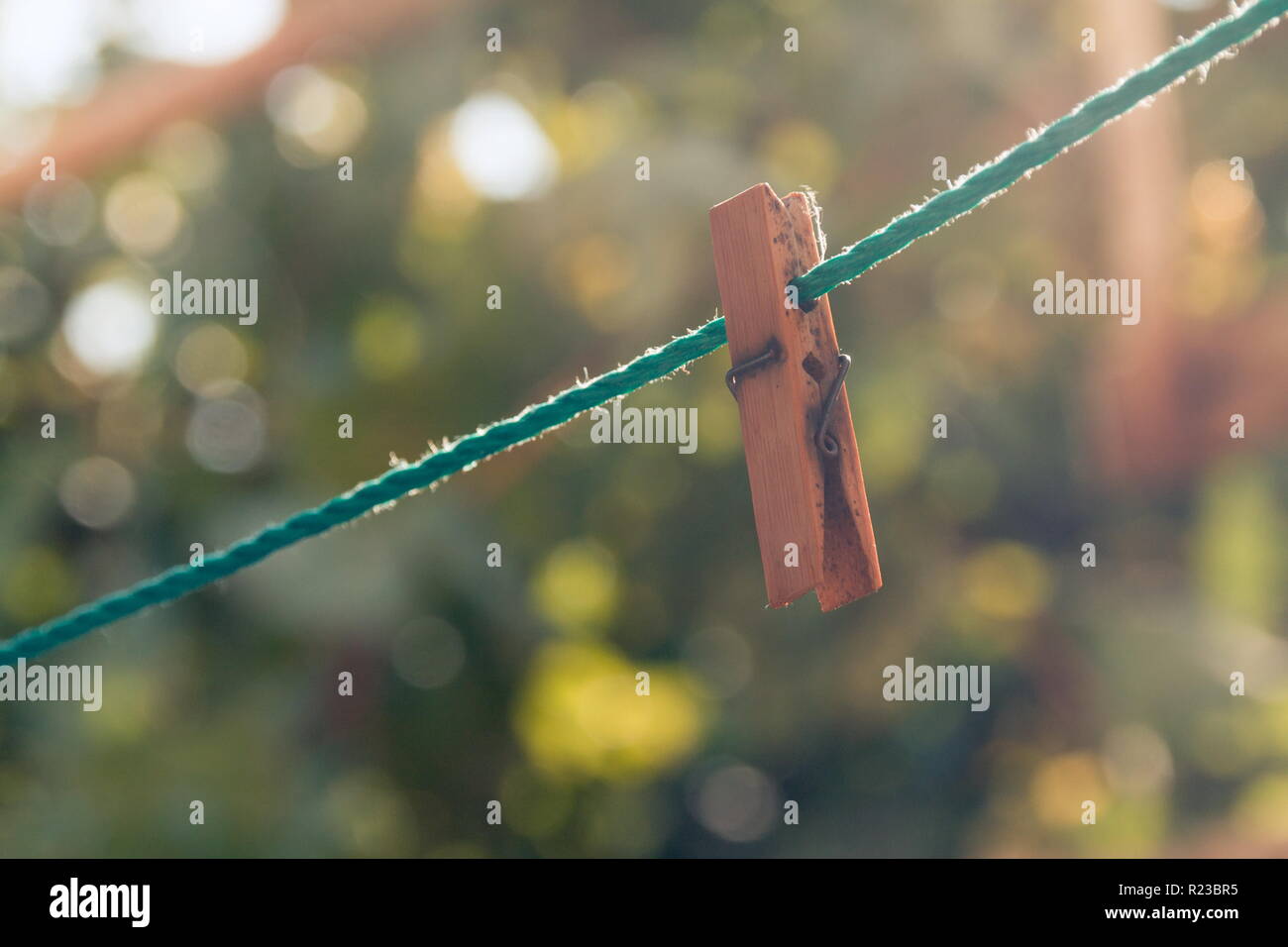 Single laundry pin on the rope Stock Photo - Alamy