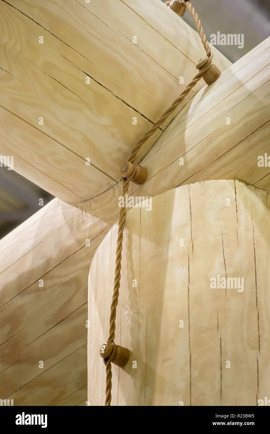 Wooden Swedish Cope profile log home wall with hinged wiring Stock ...