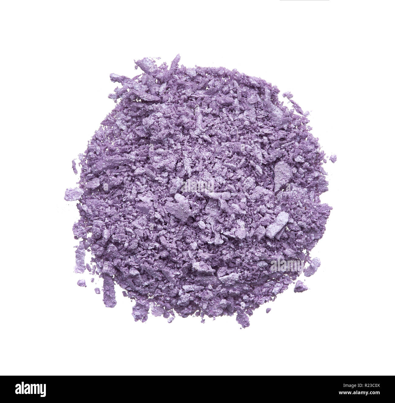 Texture of broken violet eye shadow isolated on white background. Macro ...