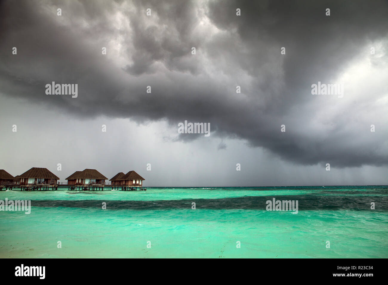 Maldives beach storm hi-res stock photography and images - Alamy
