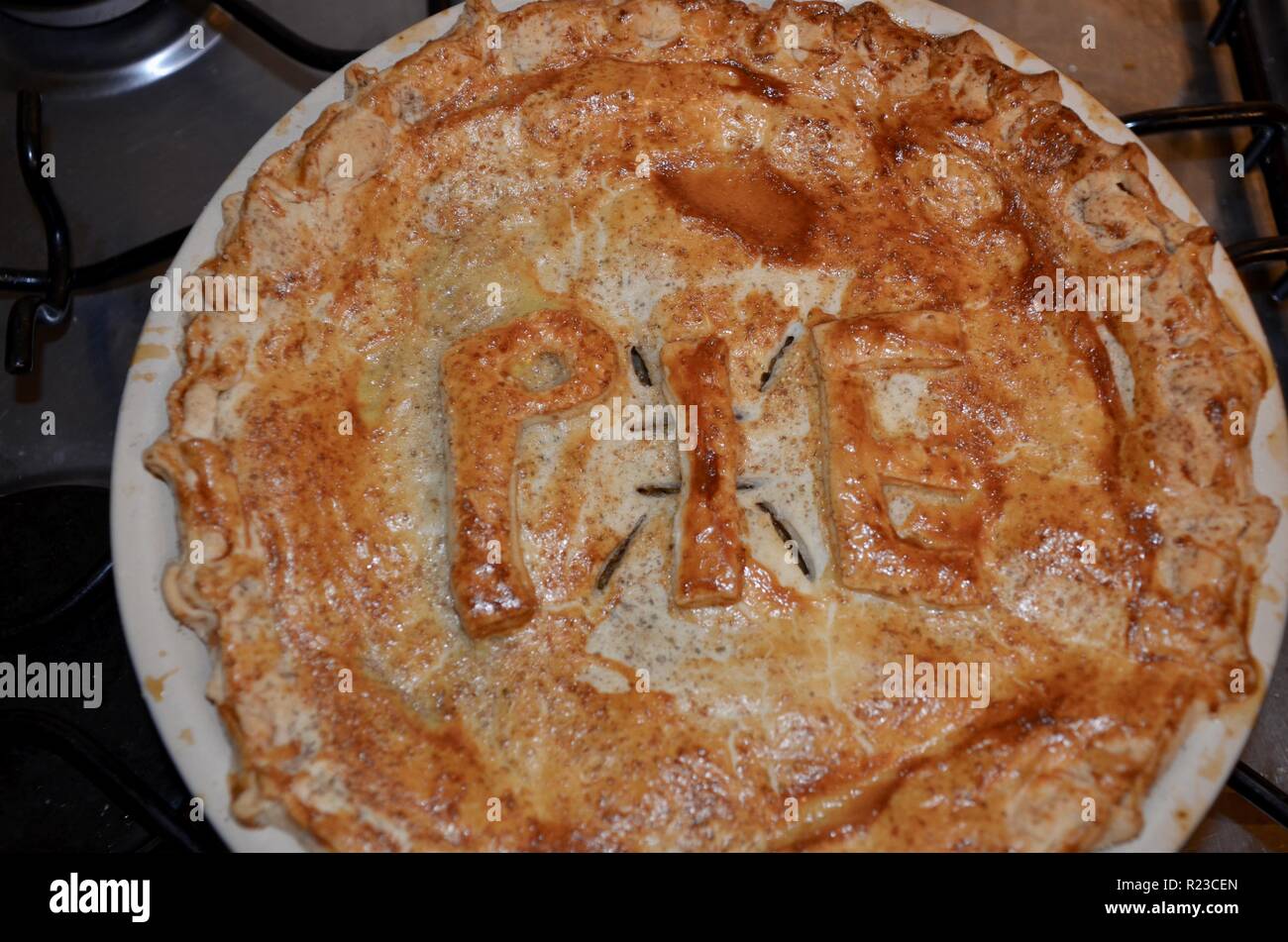 a pie with lettering spelling the word PIE on the top of it Stock Photo ...
