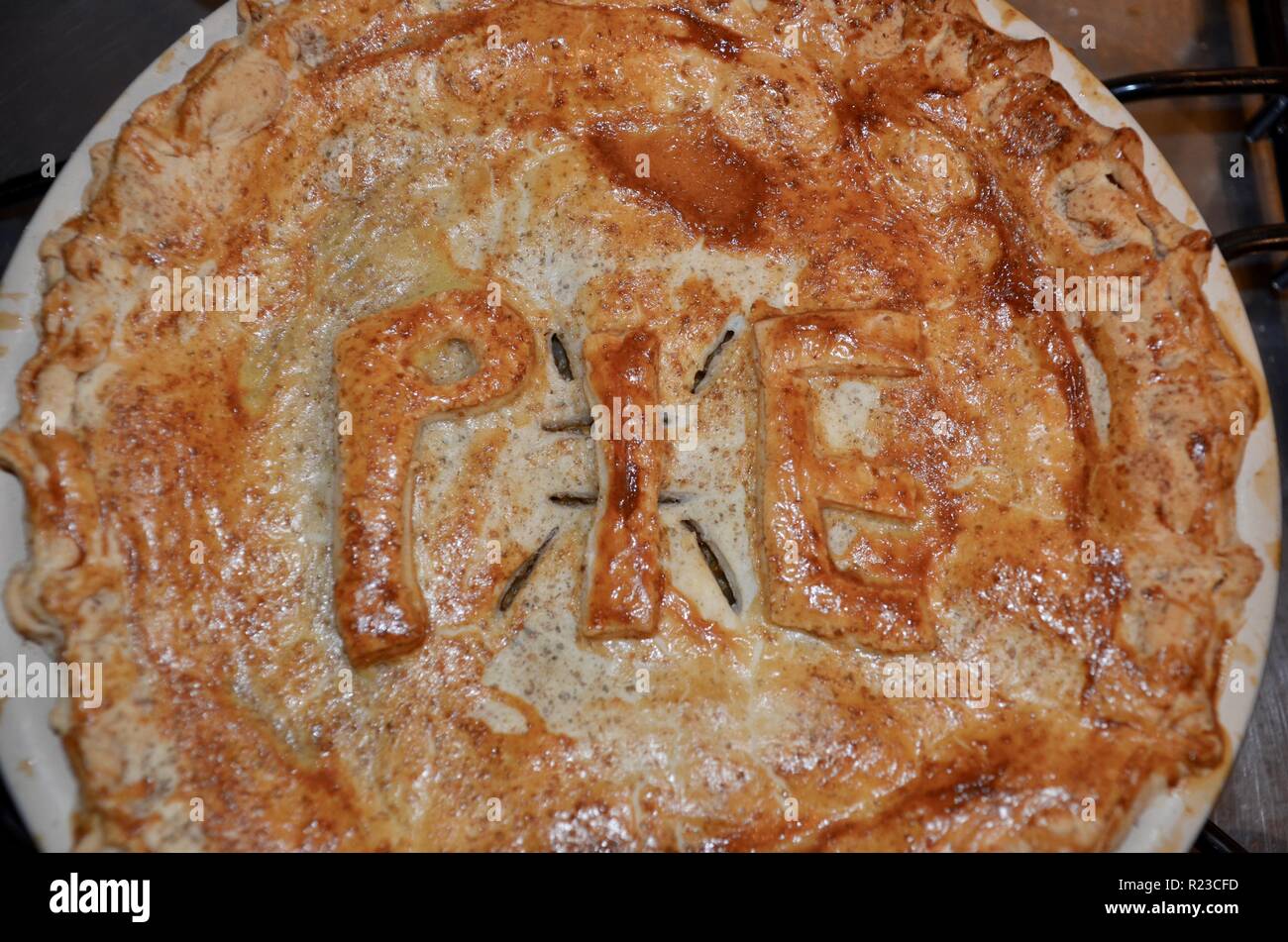 a pie with lettering spelling the word PIE on the top of it Stock Photo ...
