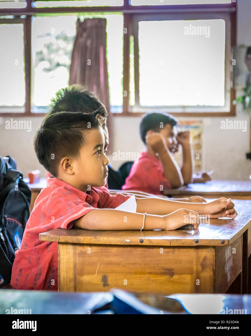 BALI, INDONESIA - APRIL 25, 2018: Young happy pupils wearing balinese ...