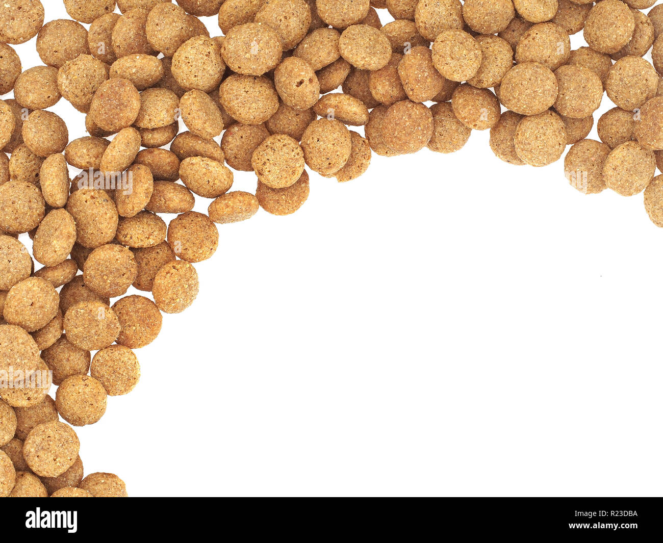 Dried dog food background on white. Border, edge Stock Photo - Alamy