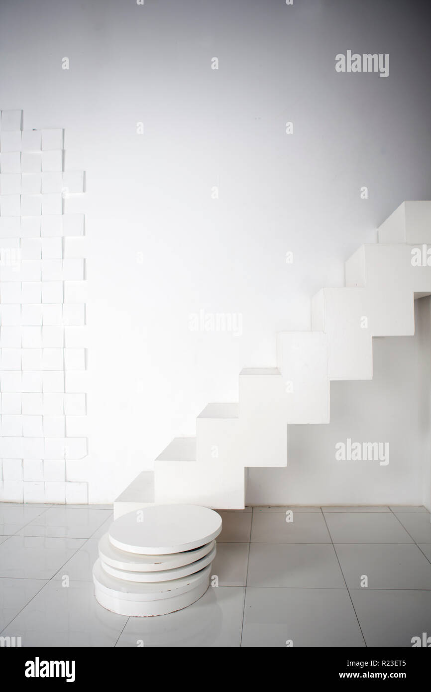 the white staircase against a white wall Stock Photo - Alamy