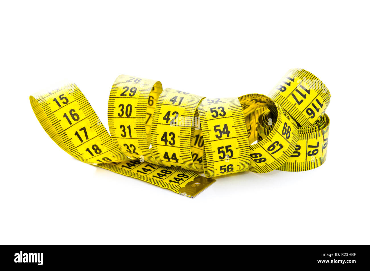 yellow centimeter isolated on a white background Stock Photo - Alamy