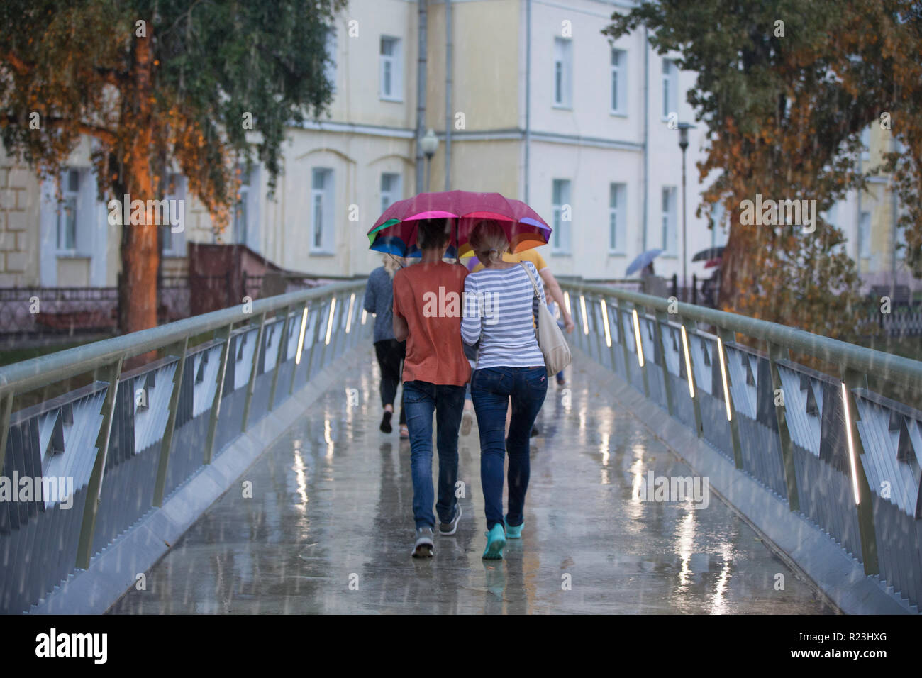 People in the rain with umbrellas. Bad weather Stock Photo - Alamy