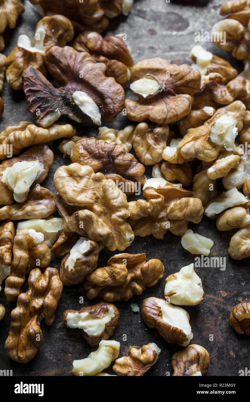 Pile of peeled walnuts on metal background, from above Stock Photo - Alamy
